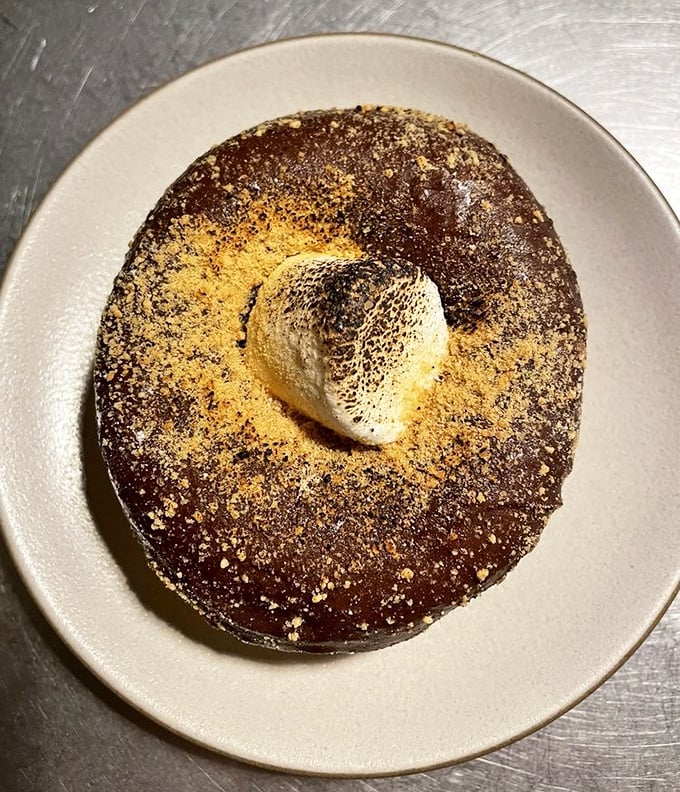 The s'more donut brings campfire nostalgia to city dwellers – a chocolate disc topped with toasted marshmallow that would make Boy Scouts jealous.