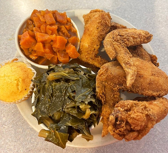 Soul food that lives up to its name—crispy fried chicken, vibrant collard greens, candied yams, and cornbread that feeds more than just hunger.