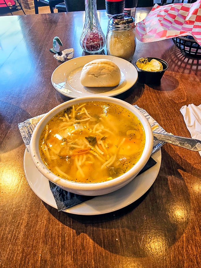 Soup that's clear enough to read your fortune in, yet flavorful enough to make you forget your troubles. That sourdough roll is standing by for dunking duty.
