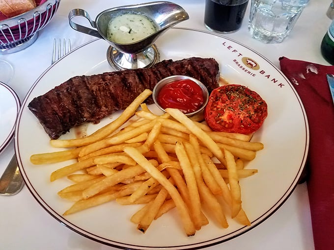 Steak frites done right – a perfectly seared cut alongside a mountain of golden fries that somehow stay crispy until the last bite. Magic!