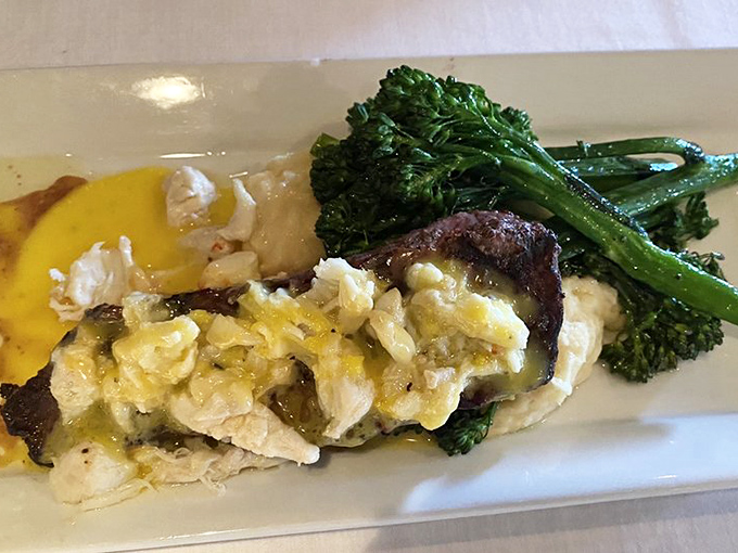 When steak meets seafood, magic happens – tender beef crowned with delicate crab and hollandaise creates a surf-and-turf romance worth writing home about.