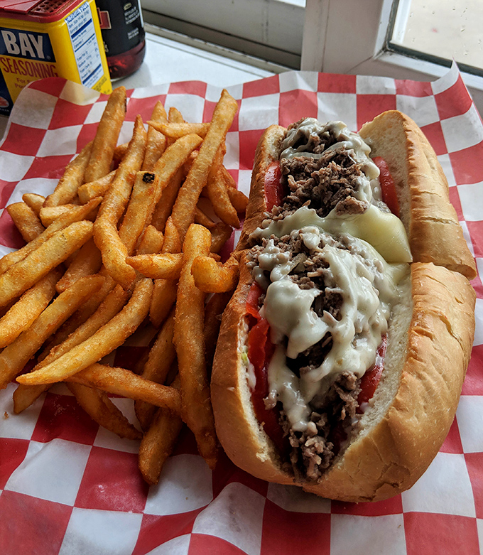 The steak and cheese sub—a symphony of thinly sliced beef, melted cheese, and fresh veggies—proves that sometimes the classics deserve their legendary status.