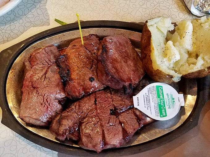 When your steak arrives sizzling on this metal platter, the sound is Wisconsin's version of a standing ovation.