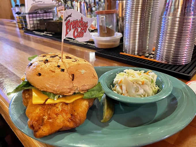 The legendary Super Grouper sandwich in all its glory. That golden-fried fish fillet hanging over the bun is the Florida equivalent of finding extra fries at the bottom of the bag.