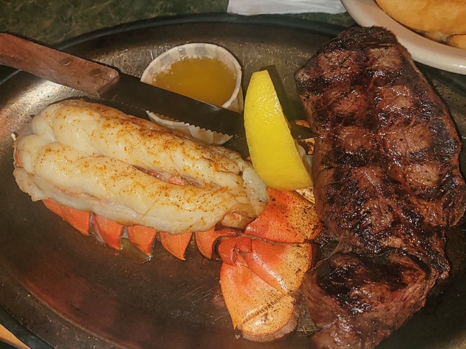 The ultimate surf and turf romance—a perfectly seared steak courting a lobster tail. Some relationships are just meant to be, especially on a dinner plate.