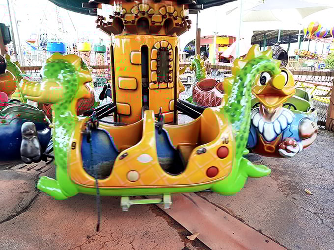 Childhood joy comes in dragon form at the Swap Shop's carnival section, where kiddie rides await the next generation of bargain hunters.