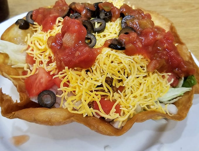 This taco salad in its crispy shell fortress isn't just Tex-Mex – it's a crunchy, cheesy architectural marvel that demands to be demolished.