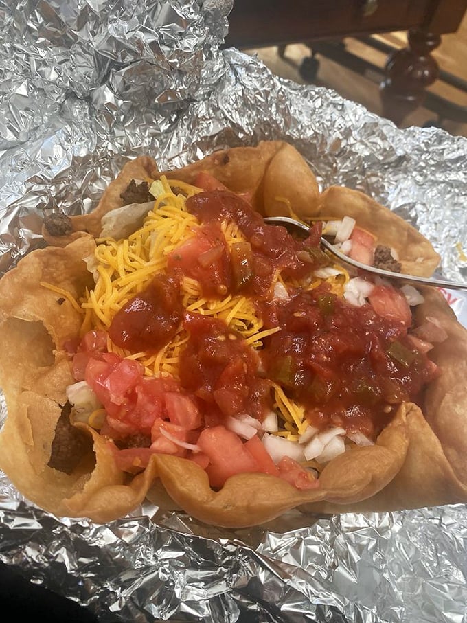 This taco salad bowl isn't just a meal, it's edible architecture—a crunchy fortress protecting a treasure of seasoned beef, cheese, and fresh veggies.