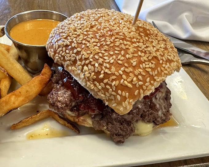 This isn't just a burger – it's architecture. A sesame-studded masterpiece that makes fast food chains want to hide in shame.