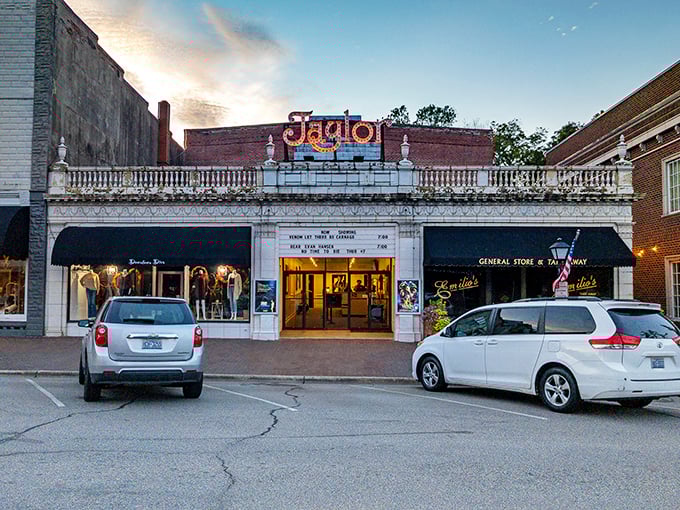 The Taylor Theater's vintage marquee lights up downtown Edenton at dusk, promising entertainment in a setting that feels delightfully frozen in time.
