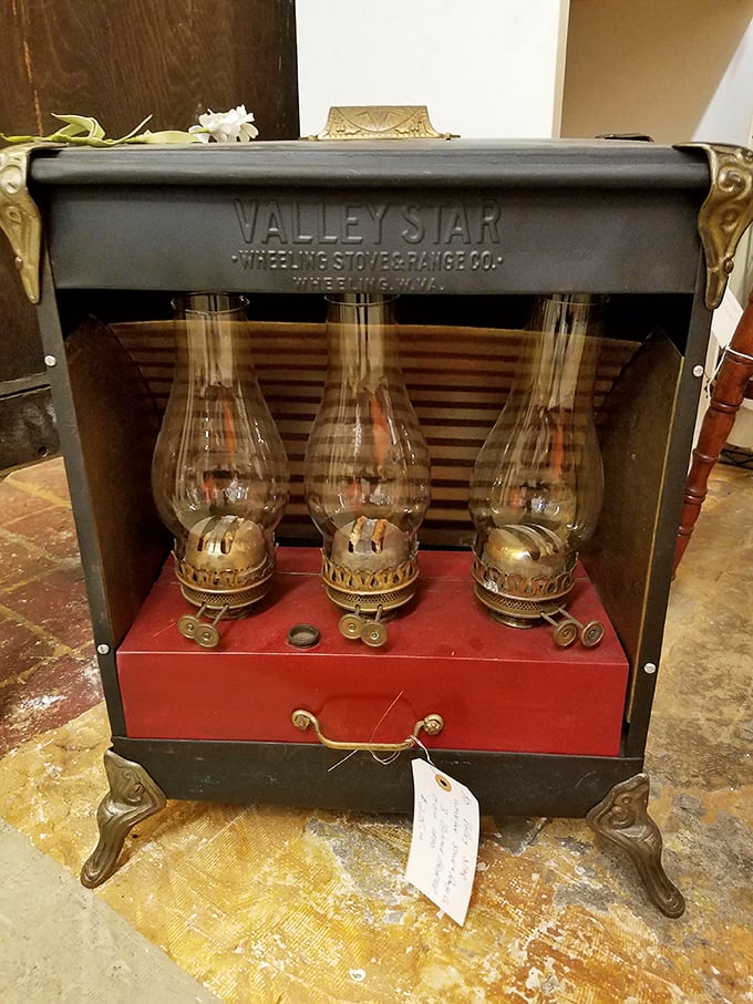 The Valley Star heater with its trio of oil lamps isn't just vintage—it's a steampunk fantasy that somehow survived to tell its tale.