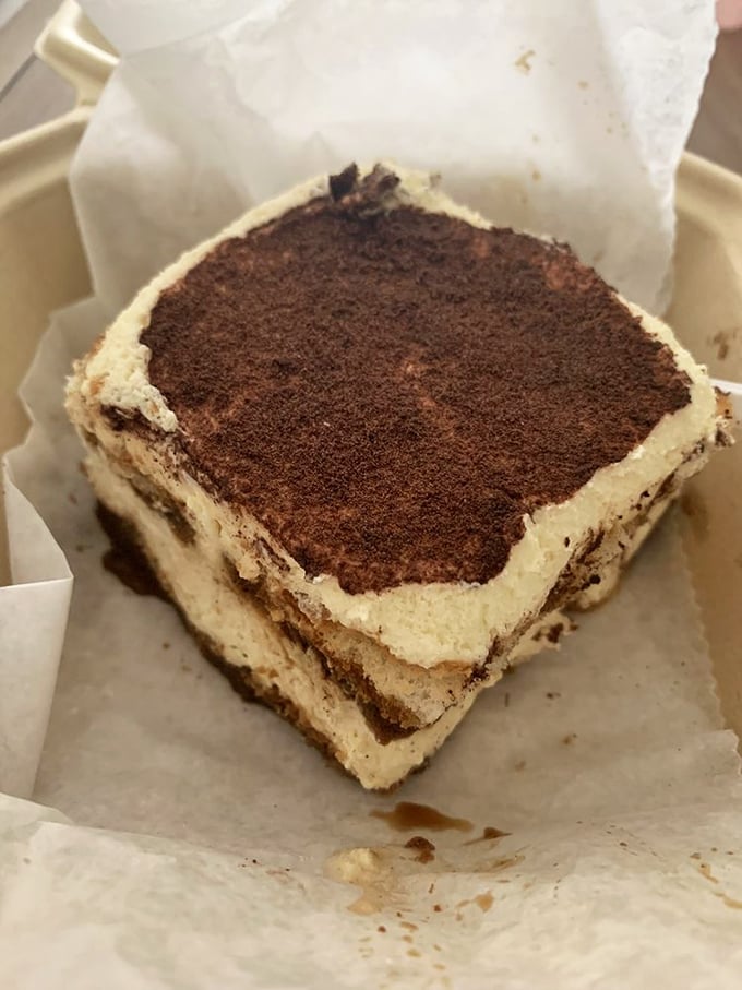 Tiramisu so perfectly layered it could teach geology classes, with cocoa dusting that would make Willy Wonka jealous.