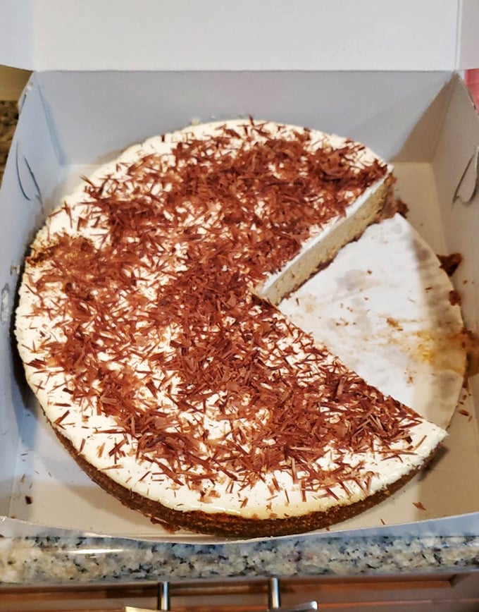 This chocolate-dusted creation with delicate shavings is like finding the dessert equivalent of a perfect sunset – fleeting but unforgettable.