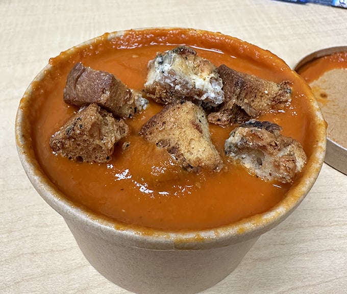 This Tomato Bisque isn't just soup—it's liquid comfort with islands of blue cheese croutons. Winter in Cleveland never tasted so optimistic.