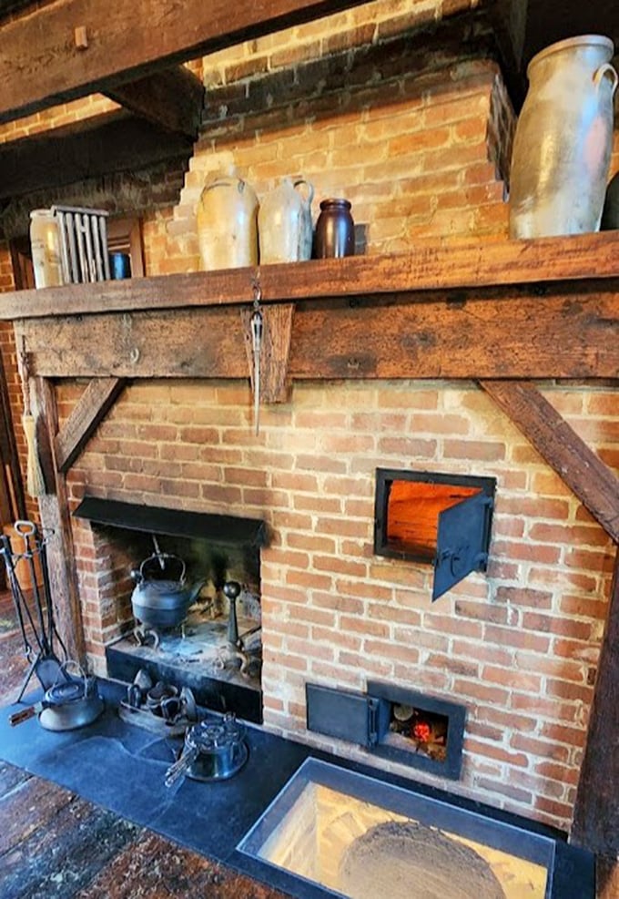 This brick hearth kitchen with its cast iron implements makes modern cooking look suspiciously easy. No "quick 30-minute meals" were happening here!