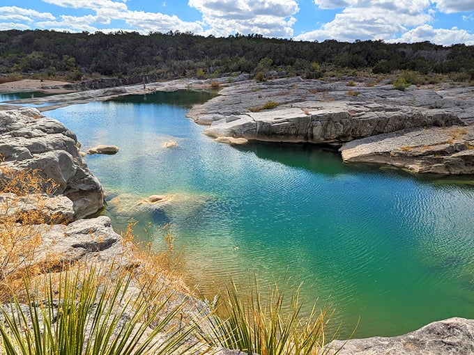 The perfect swimming hole doesn't exi— Oh wait, here it is! Turquoise waters cradled by ancient limestone make summer bearable.