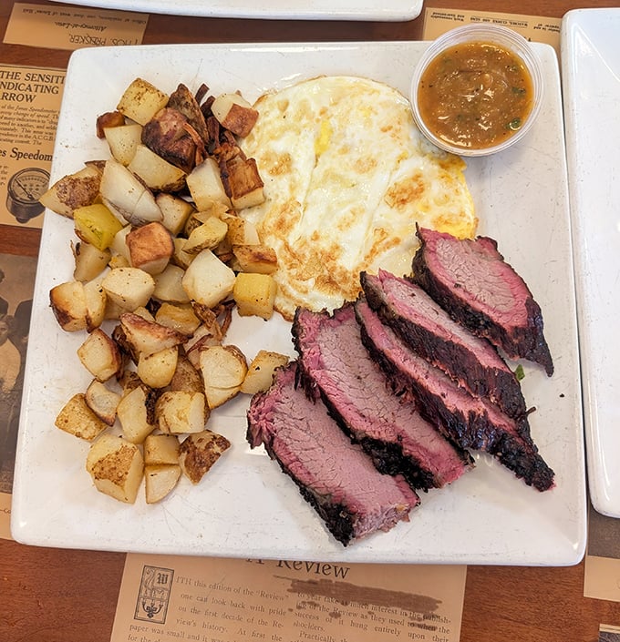 Tri-tip and eggs—California's answer to steak and eggs. The meat's perfect pink center suggests someone in the kitchen really, really cares about your happiness.