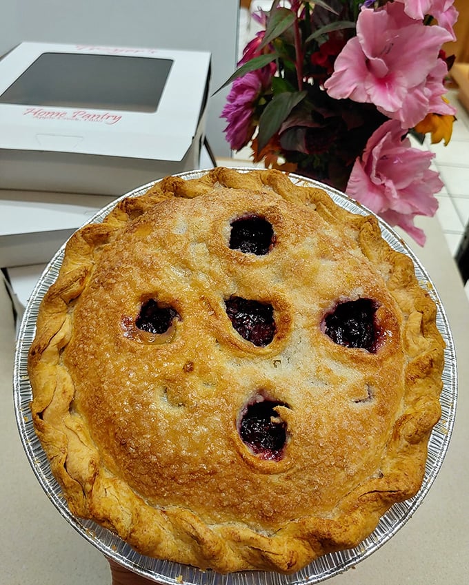 This berry pie with its perfectly vented crust isn't just photogenic—it's the dessert equivalent of winning the lottery.