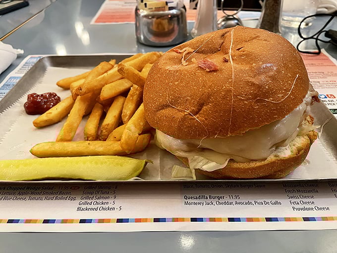 A turkey burger that defies the "healthy option curse" – juicy, flavorful, and served on a bun that actually contributes to the experience.