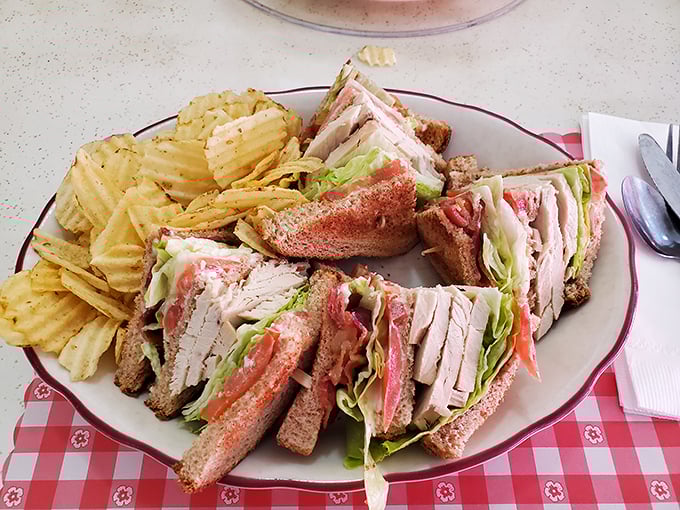 This club sandwich isn't stacked for Instagram—it's built this way because that's how proper sandwiches have always been constructed.