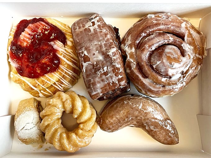 A bakery box that's better than any treasure chest. This assortment of pastries represents the four major food groups: glazed, frosted, filled, and "just one more."