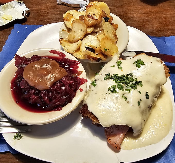 Cheese makes everything better, especially when it's blanketing a perfectly breaded cutlet. The German potatoes look like they're plotting to steal the show.