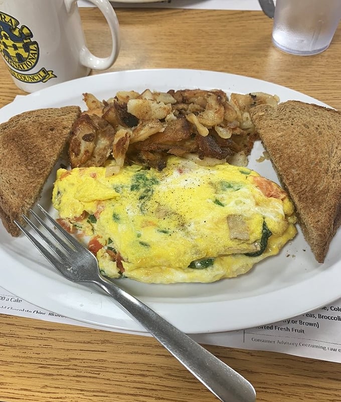 This isn't just an omelet—it's a garden harvest tucked into fluffy eggs. The kind of breakfast that makes vegetables feel like an indulgence rather than a virtue.