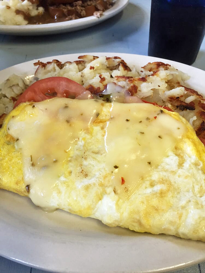 An omelet that's seen the veggie garden and hash browns with the perfect crisp-to-tender ratio – breakfast alchemy at its finest.