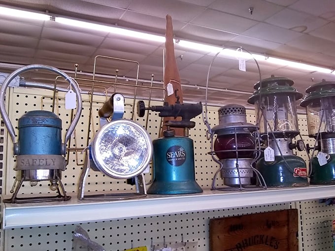Old Sears lanterns and camping equipment that illuminated adventures long before LED headlamps and smartphone flashlights existed.