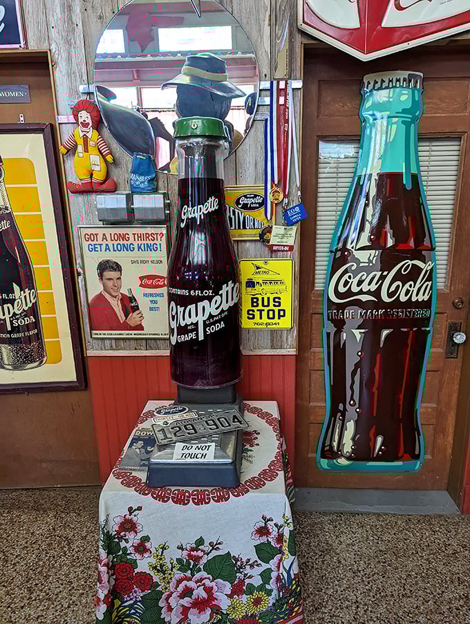 That Grapette soda bottle is bigger than my first apartment! Vintage beverage memorabilia creates a fizzy trip down memory lane.