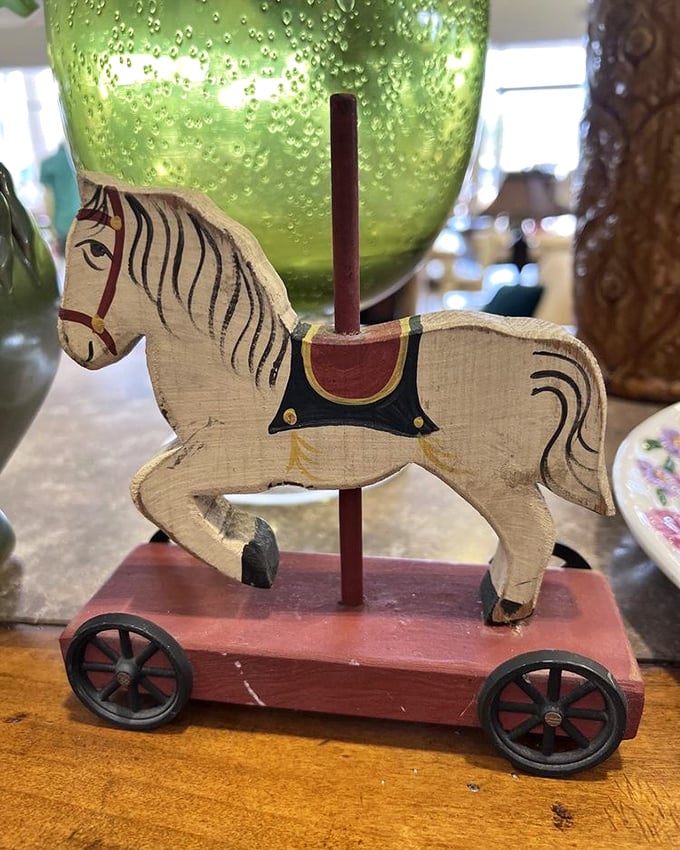 This vintage wooden carousel horse isn't just a toy—it's a time machine to childhoods past, no quarters required.