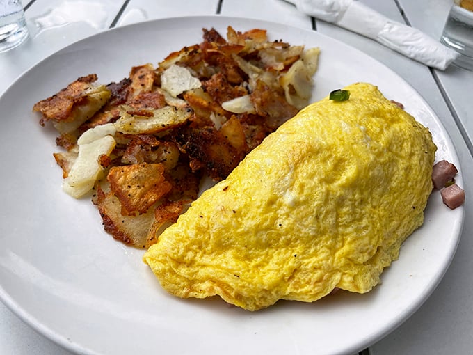 Breakfast perfection on a plate. This fluffy omelet with perfectly crispy home fries proves that sometimes the classics need no improvement.