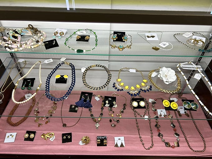 Jewelry cases displaying treasures that might have graced someone's most memorable moments before you.