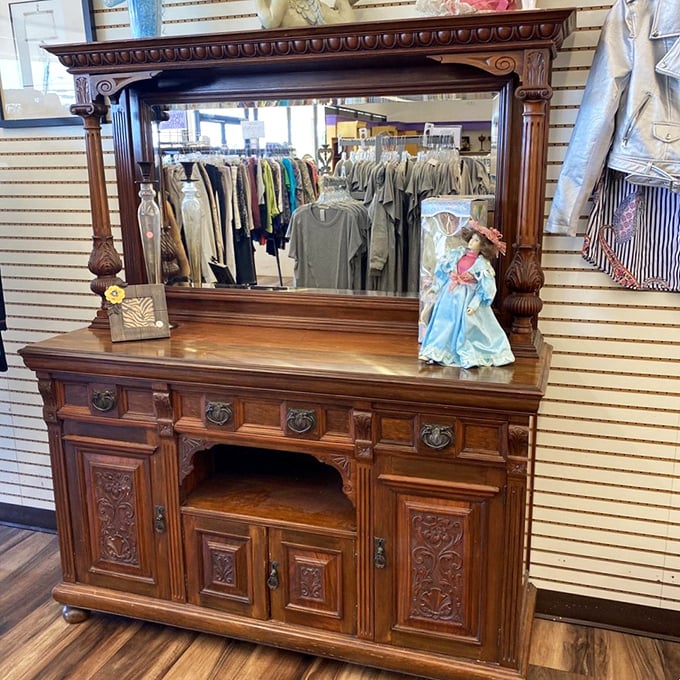 Not just a sideboard—a time machine to Grandma's house. Complete with intricate woodwork that craftsmen today would charge you a small fortune to replicate.