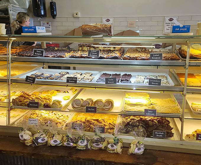 The display case at Fritz's is like the Louvre of baked goods—each shelf a different gallery of buttery masterpieces waiting for their moment.