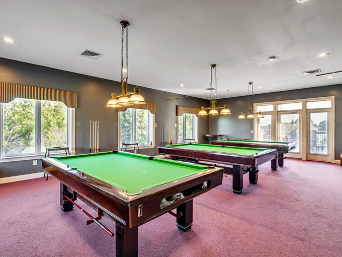 Retirement pool sharks in their natural habitat. These tables have witnessed more friendly trash talk and disputed shots than a Philadelphia Eagles tailgate party.