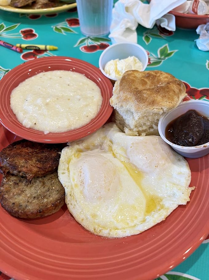 The Flying Biscuit Breakfast in all its glory—where eggs, grits, and that famous biscuit unite for morning magnificence.