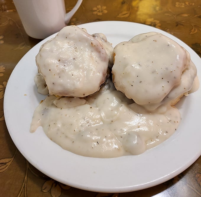 Biscuits swimming in peppery gravy—a breakfast so comforting it's basically therapy on a plate. Your cardiologist need never know.