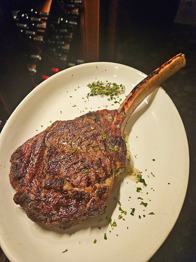 This bone-in masterpiece isn't just a steak—it's a primal experience. Fred Flintstone would approve of this magnificent meat lollipop.