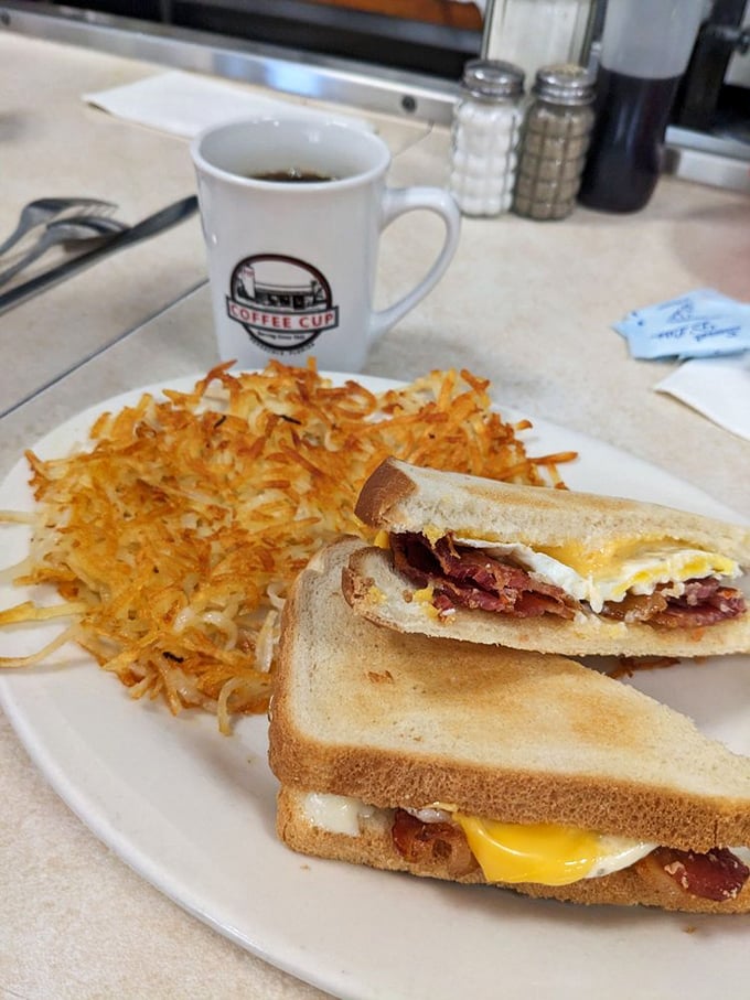 The breakfast sandwich and hash browns combo that makes you question why anyone would ever skip breakfast. Morning salvation on a plate.