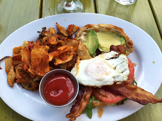 Breakfast sandwich architecture at its finest—a masterpiece of melty cheese, farm-fresh ingredients, and hand-cut fries that puts ordinary breakfast to shame.
