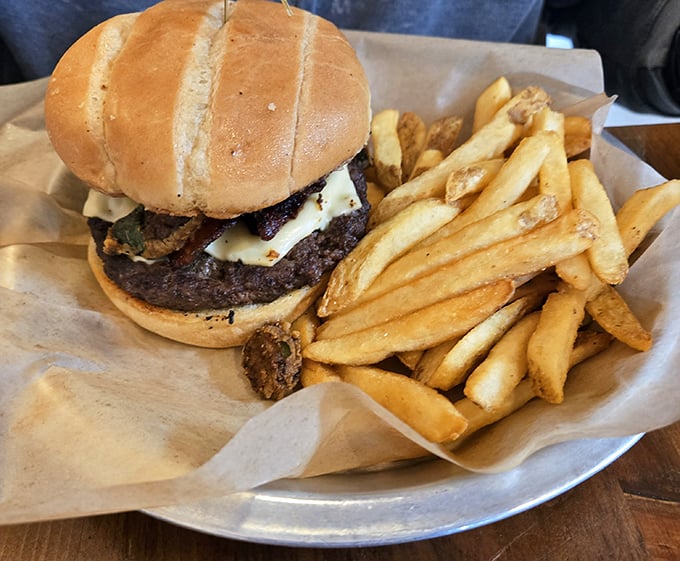 A burger that doesn't need fancy frills to impress—just honest beef, a proper bun, and fries that could start their own fan club.