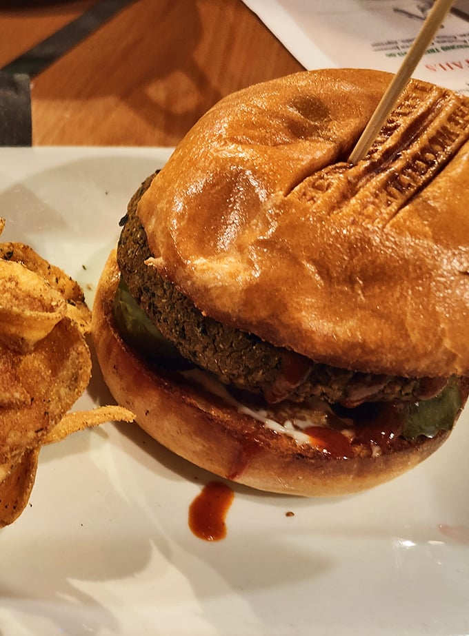 Not all heroes wear capes—some come on brioche buns. This burger demands both hands and your undivided attention.