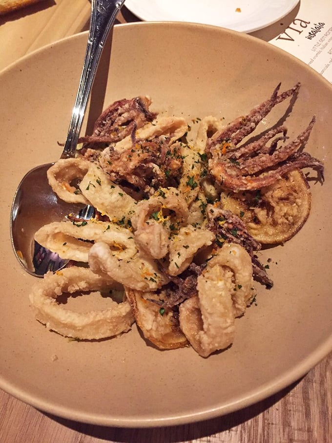 Calamari so perfectly fried it makes you wonder why anyone would ever serve it any other way.