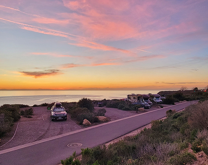 Camping with an ocean soundtrack – where the parking spots come with million-dollar views and no room service to interrupt your peace.
