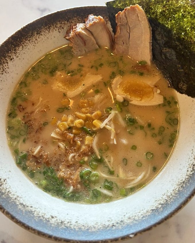 The chicken broth ramen proves that sometimes the lightest option carries the deepest flavor. Those green onions aren't just garnish—they're game changers.