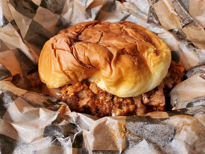 The chicken sandwich: where pillowy bun meets crispy heat in a relationship that's both complicated and deeply satisfying.