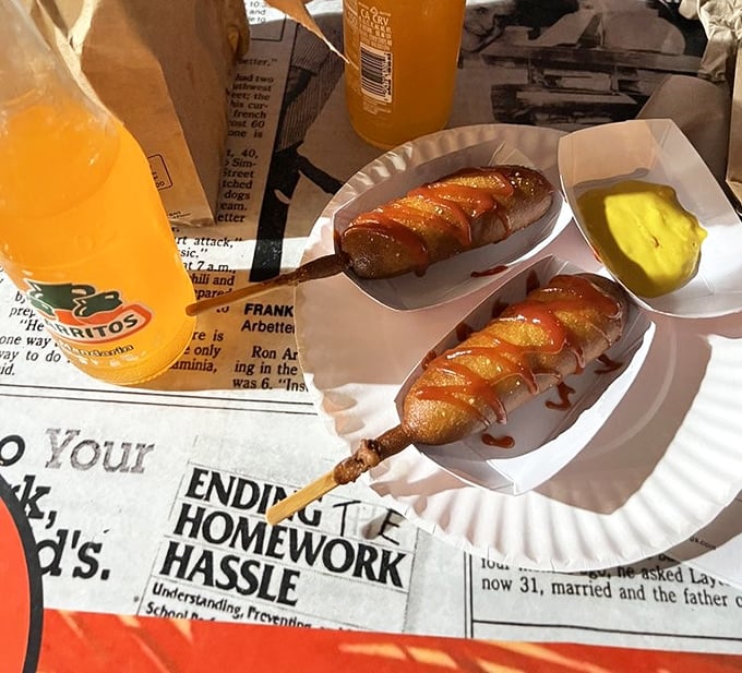 Corn dogs on a stick—the perfect portable indulgence, with that satisfying contrast between sweet cornbread exterior and savory hot dog center.