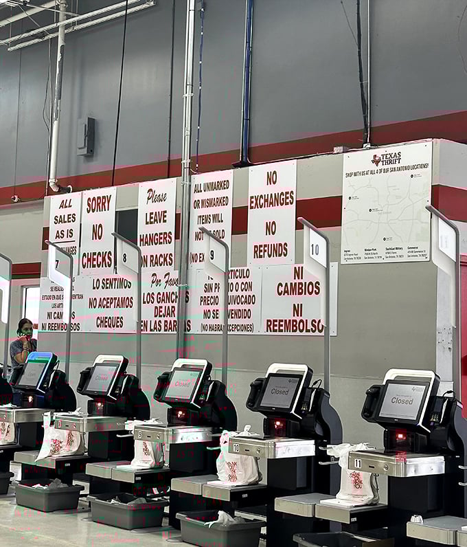 The checkout area lays down the law in two languages. All sales final—a reminder that thrifting, like life, requires commitment to your choices.