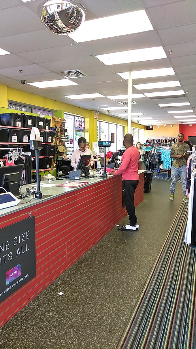The checkout counter—where fashion dreams meet reality and wallets breathe sighs of relief at the final total.